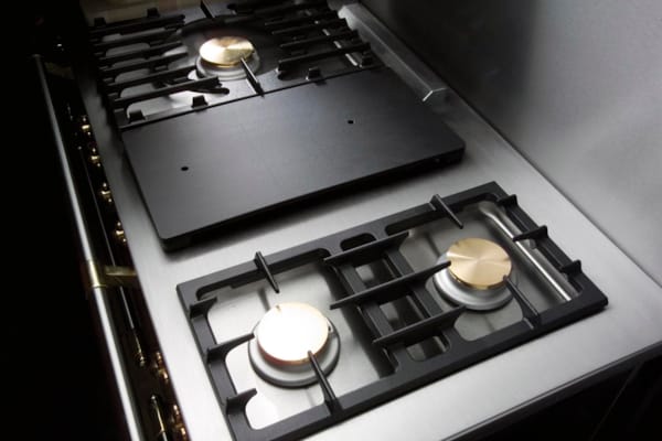 Plaque de mijotage pour gaz